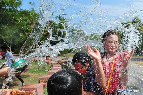 People splash water to celebrate Songkran Festival in Thailand - Global ...
