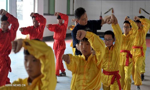 Students learn martial arts during summer vocation in China - Global Times