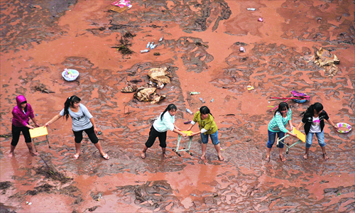 Heavy rains add to Yiliang quake woes - Global Times