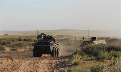 PLA holds real-combat confrontation drills - Global Times