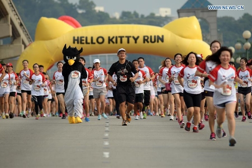 Hello Kitty Run held in Singapore to celebrate its 40th birthday ...