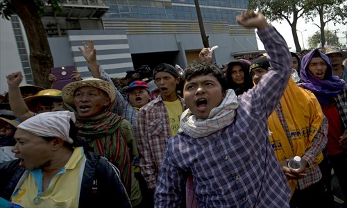 Rice farmers rally against government - Global Times