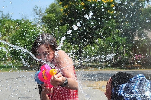 People splash water to celebrate Songkran Festival in Thailand - Global ...