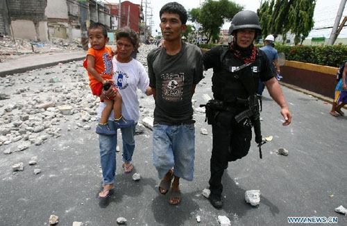 One killed and dozens injured in Philippine violence - Global Times