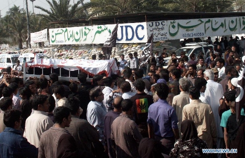 Pakistani Muslims hold funeral for slain community leader - Global Times
