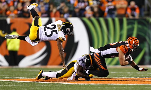 Flying tackle - Global Times