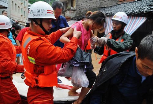 Heavy rains cause 62,600 transferred in SW China - Global Times