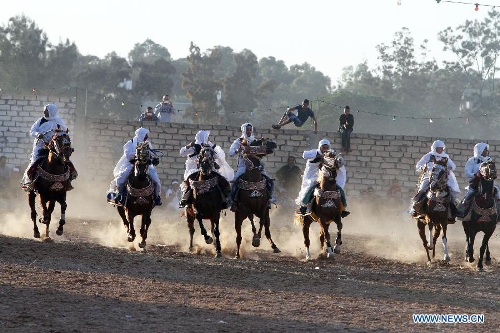 Libyan horse riders participate in tradition show - Global Times