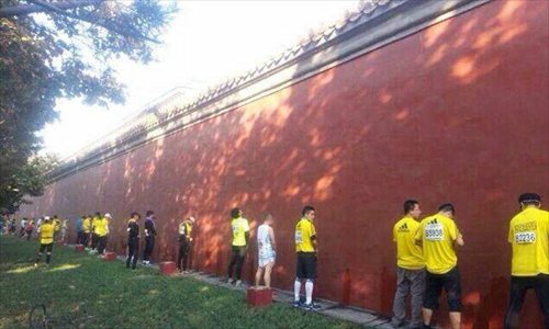 BJ runners' 'traditional' custom of urinating questioned - Global Times
