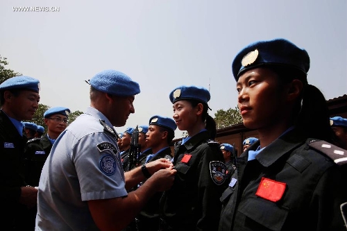 UN awards Chinese peacekeeping police riot squad Peace Medal in Liberia ...