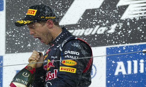 Vettel win puts title on knife-edge - Global Times