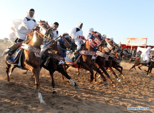 Libyan horse riders participate in tradition show - Global Times