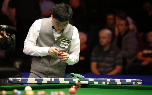 Ding Junhui competes during UK Snooker Championship - Global Times