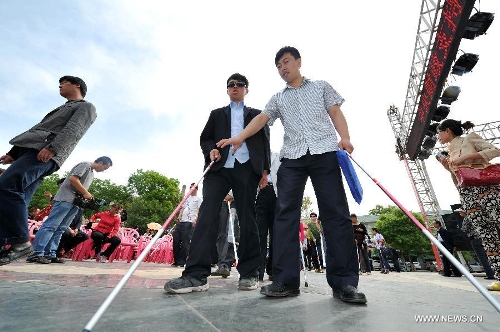 Activity held in Yinchuan to help the blind walk - Global Times