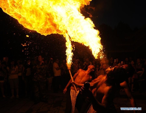 Tourists, performers mark traditional Torch Festival in SW China ...