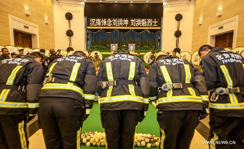 People mourn for 2 firefighters killed in Beijing shopping mall blaze ...