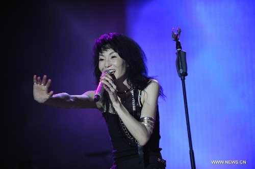 HK film star Maggie Cheung performs at Strawberry Music Festival ...