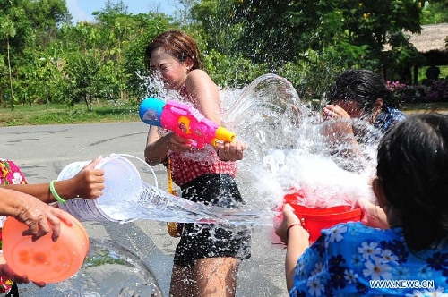 People splash water to celebrate Songkran Festival in Thailand - Global ...