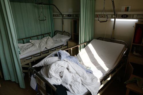Empty bed - Global Times