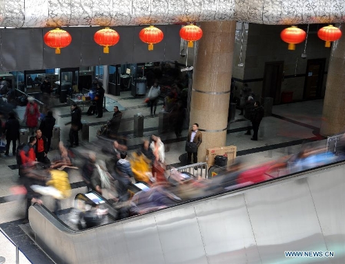 China's transport system sees travel rush around Spring Festival ...