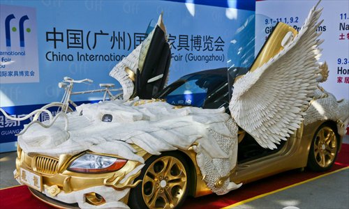 Gorgeous or gaudy? Gold-plated Buddha Beemer baffles at China car show ...