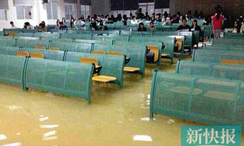 College students take exam in flooded classroom - Global Times
