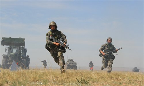 PLA holds real-combat confrontation drills - Global Times