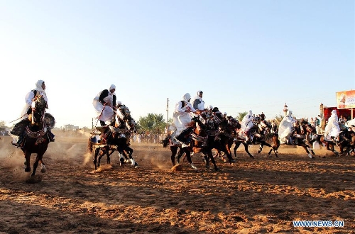 Libyan horse riders participate in tradition show - Global Times