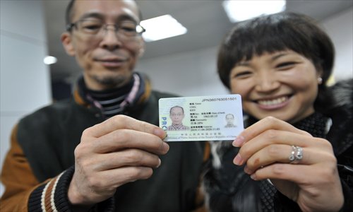 Feeling blue over green cards - Global Times