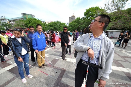 Activity held in Yinchuan to help the blind walk - Global Times