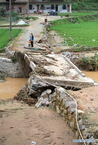 Heavy rain triggers floods and landslides in S China - Global Times