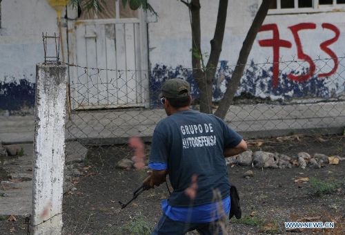 Mexican community forms self-defense groups to fight crime gangs ...
