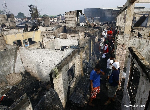 Philippine fire razes 500 houses, leaving 2,000 residents homeless ...