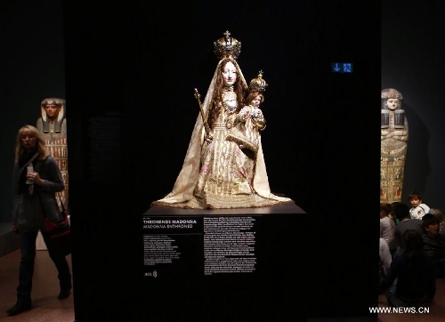 Visitors admire art works at hyper realistic sculpture exhibition in ...