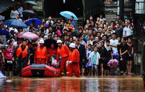 Heavy rains cause 62,600 transferred in SW China - Global Times