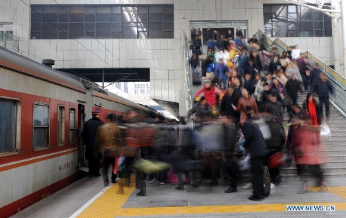 China's transport system sees travel rush around Spring Festival ...