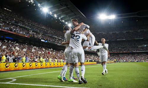 Real storm back to take Super Cup trophy - Global Times