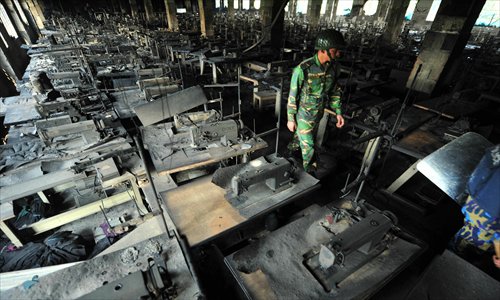 Garment factory fire kills over 100 - Global Times