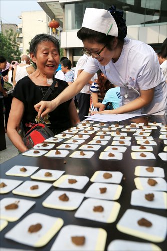 TCM therapies in a heat wave - Global Times