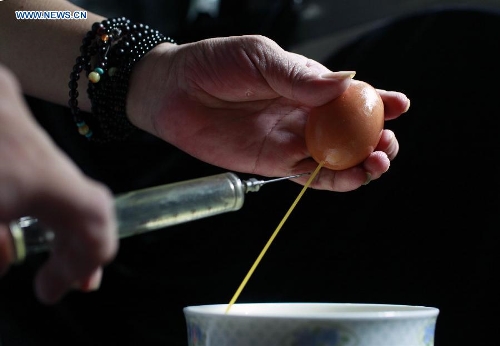 Egg carvings by artist Chen Huaming - Global Times