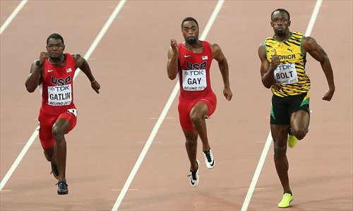Bolt retains 100-meter dash title in Beijing - Global Times