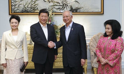 Xi and Peng: A stylish couple in 'lovers' clothes' - Global Times
