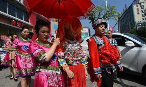 Young Miao couple get married in traditional way - Global Times