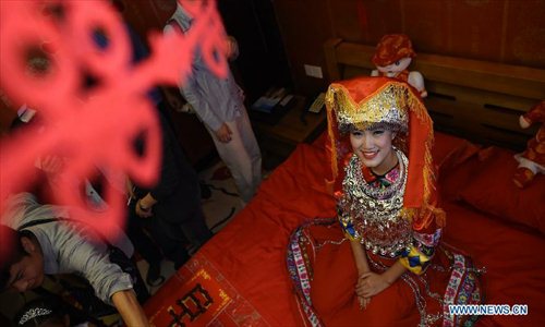 Young Miao couple get married in traditional way - Global Times