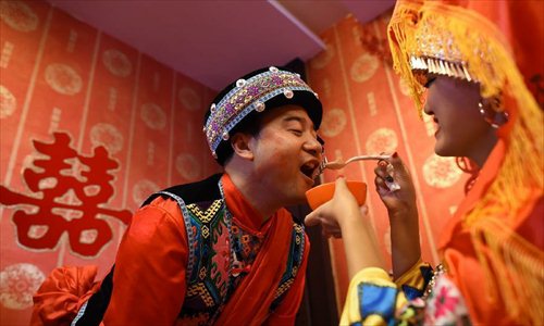 Young Miao couple get married in traditional way - Global Times