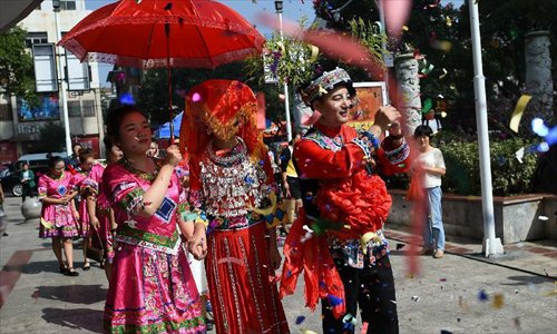 Young Miao couple get married in traditional way - Global Times