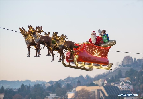 Flying Santa Claus stunts show seen in Montreux, Switzerland - Global Times