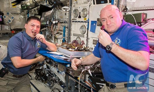 Space station astronauts grow first flower outside Earth - Global Times