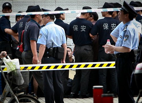 Shanghai’s downtown police keep their cool on patrol - Global Times