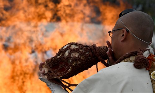 Purifying flames - Global Times